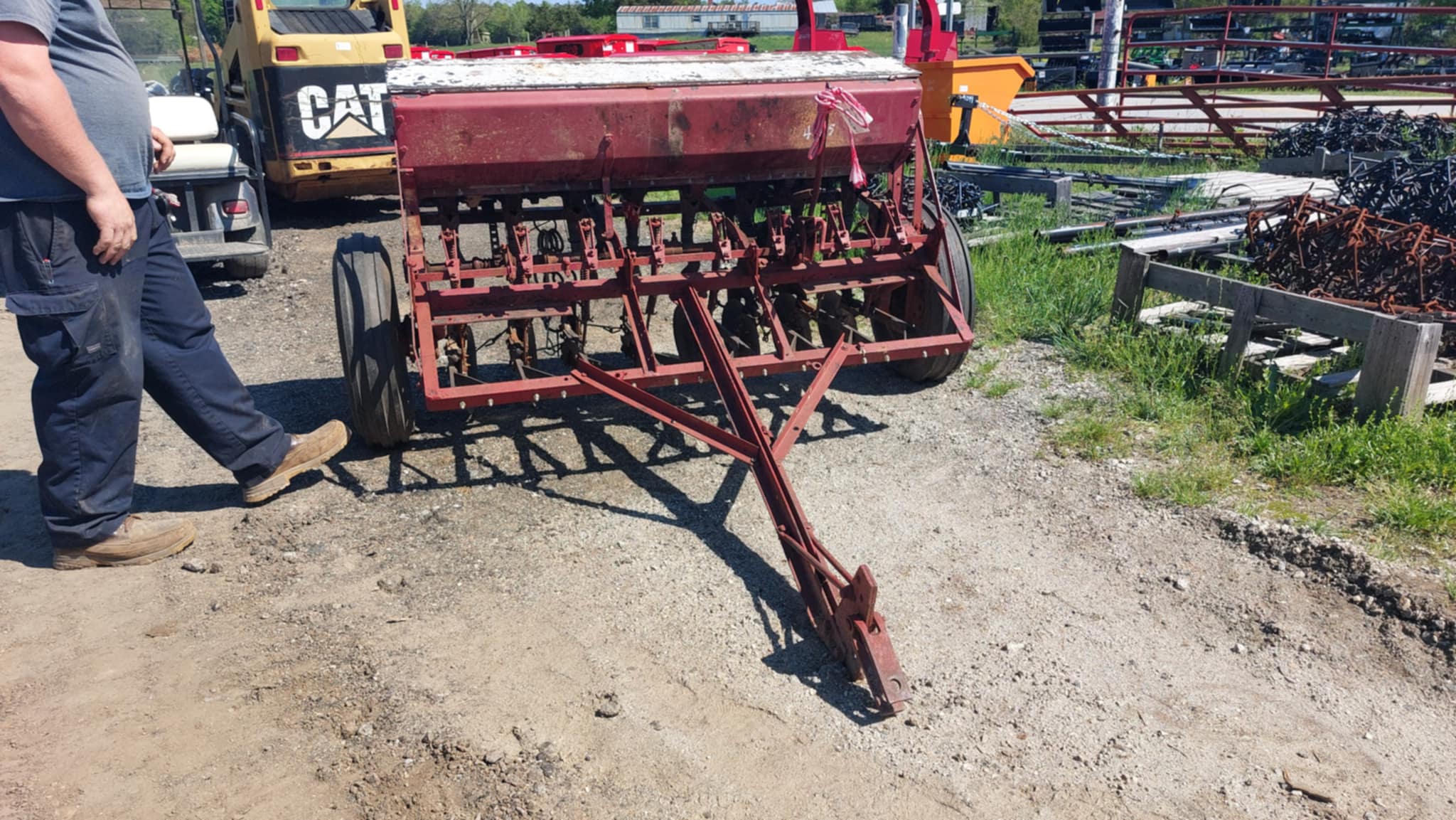 Used - McCormick 8 Row grain drill w/ Fertilizer Hopper | Ivey's Equipment